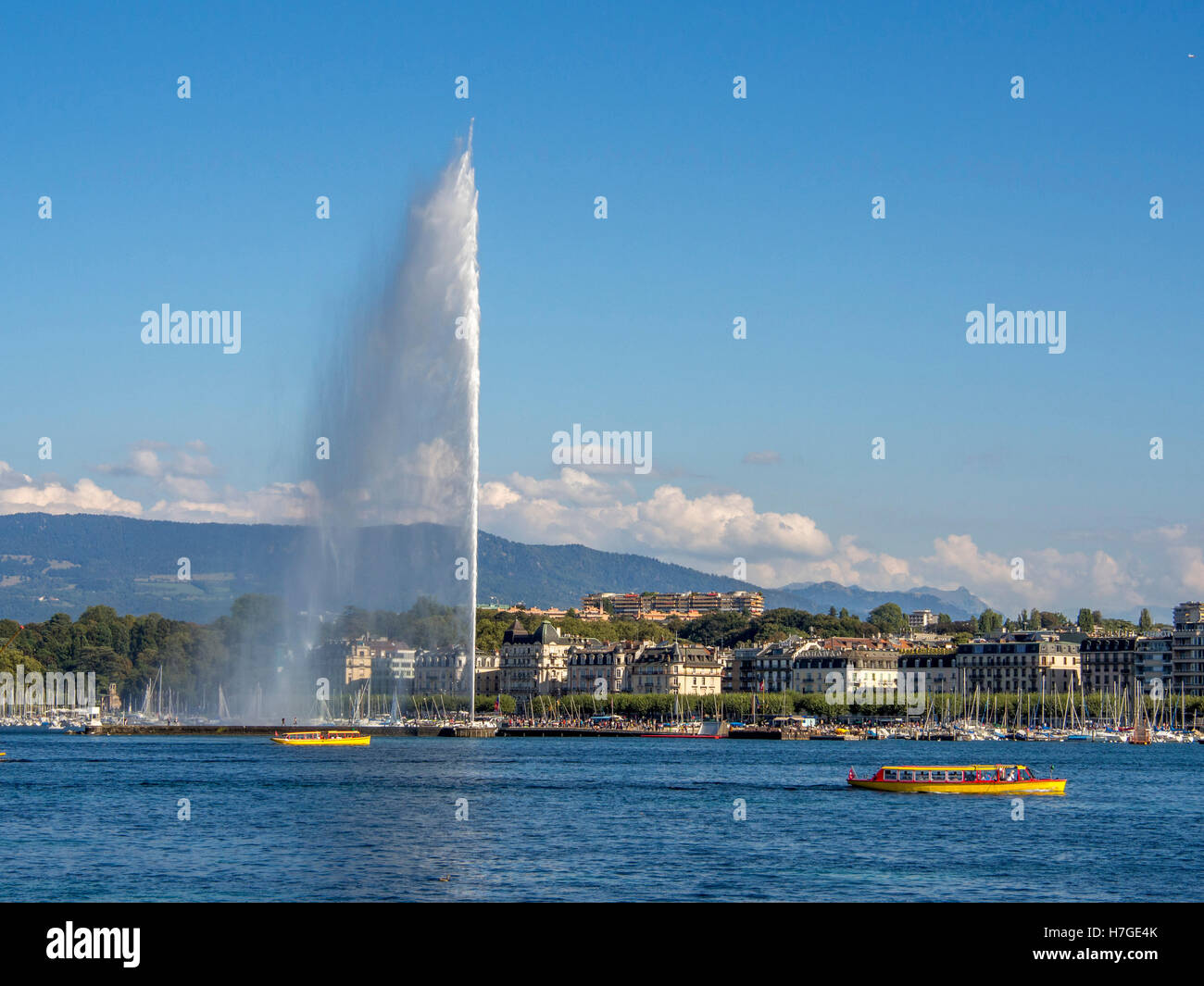 View of Lake Geneva featuring the Jet d'Eau fountain soaring high at ...