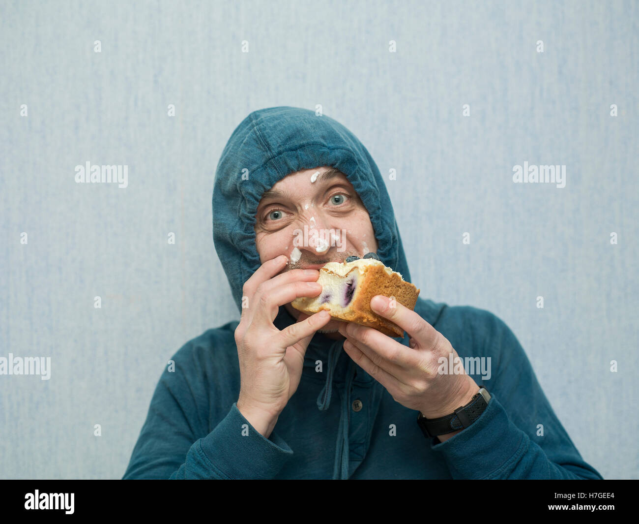 Man eating cake face hi-res stock photography and images - Alamy