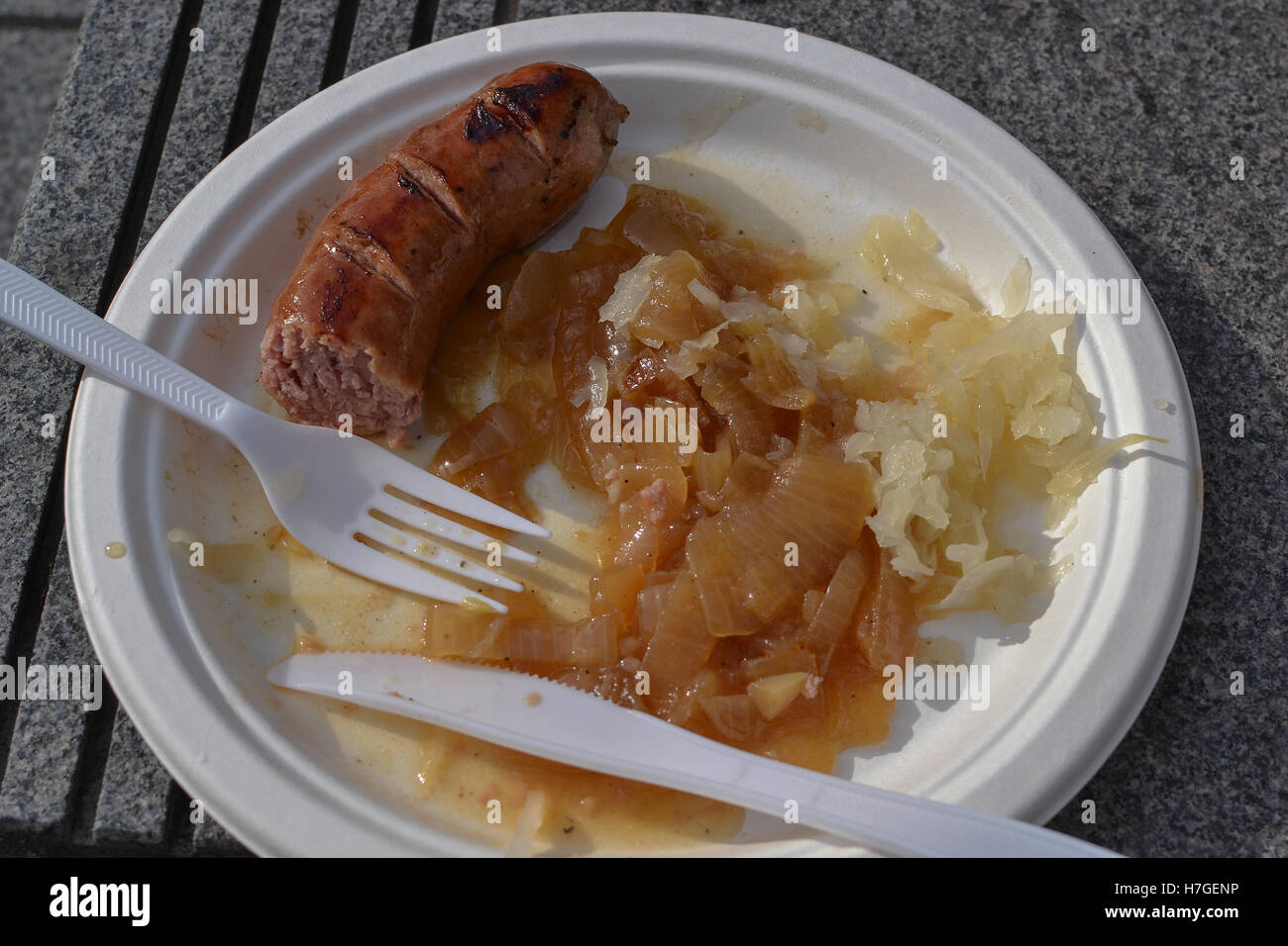 Bratwurst on plate, on the stairs at a sidewalk, Portland Saturday ...