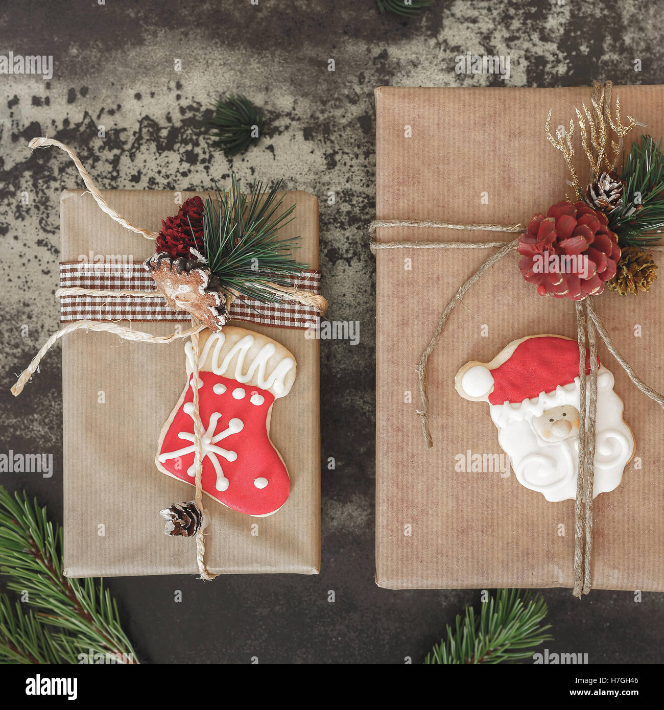 Christmas gift. Beautiful presents in brown paper tied with string and ...