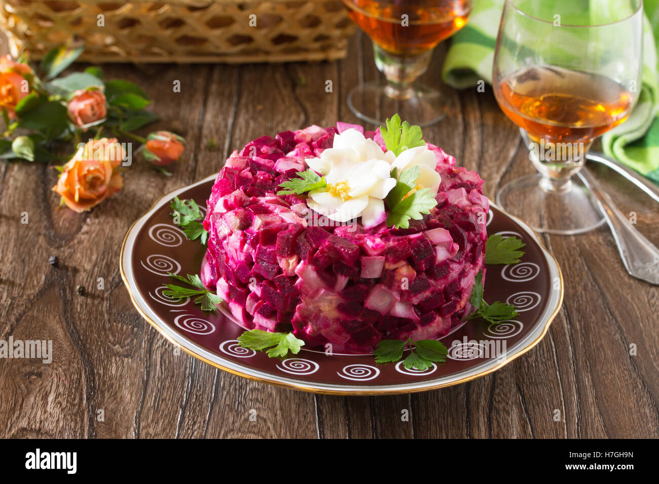 Holiday beet salad, decorated with flowers from the egg and parsley on ...