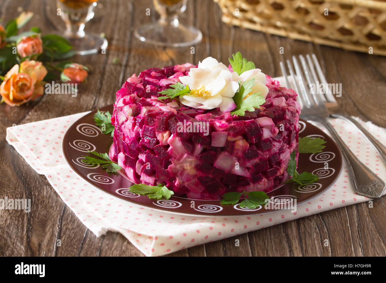 Holiday beet salad, decorated with flowers from the egg and parsley on ...
