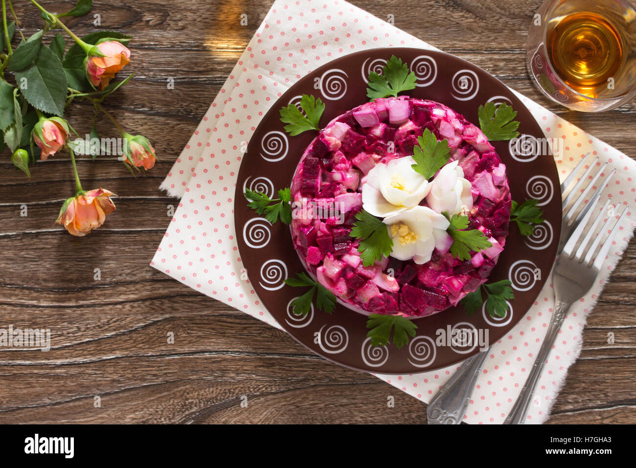 Holiday beet salad, decorated with flowers from the egg and parsley on ...