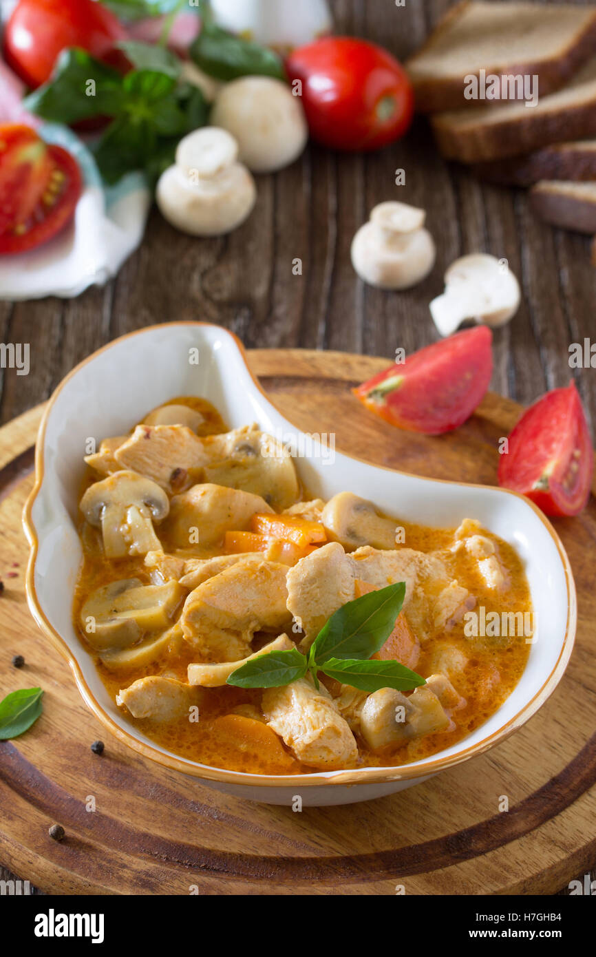 Traditional hot ragout with meat and mushrooms (chicken, mushrooms ...