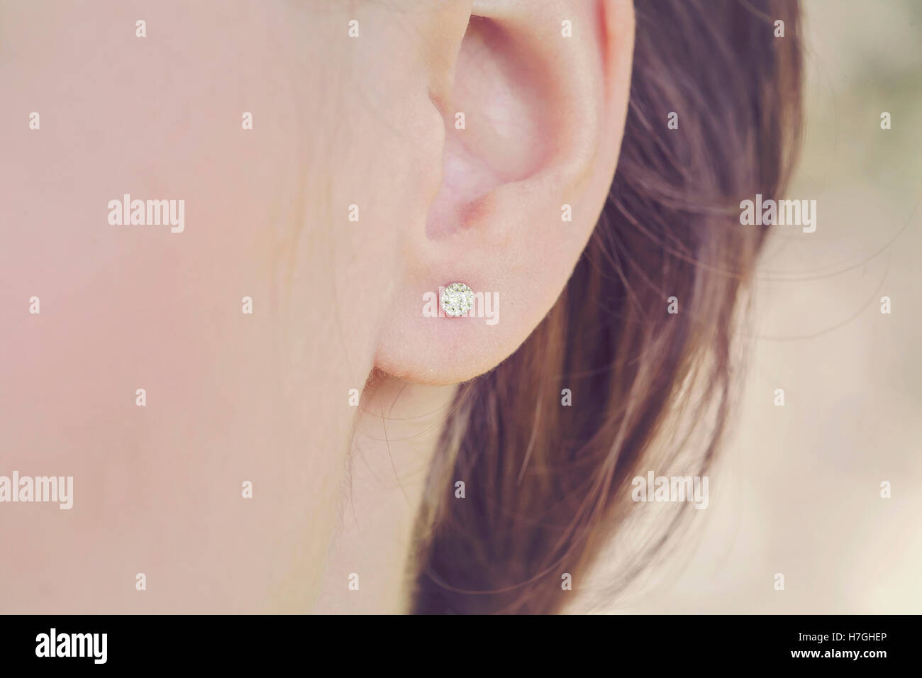Womans earring hi-res stock photography and images - Alamy