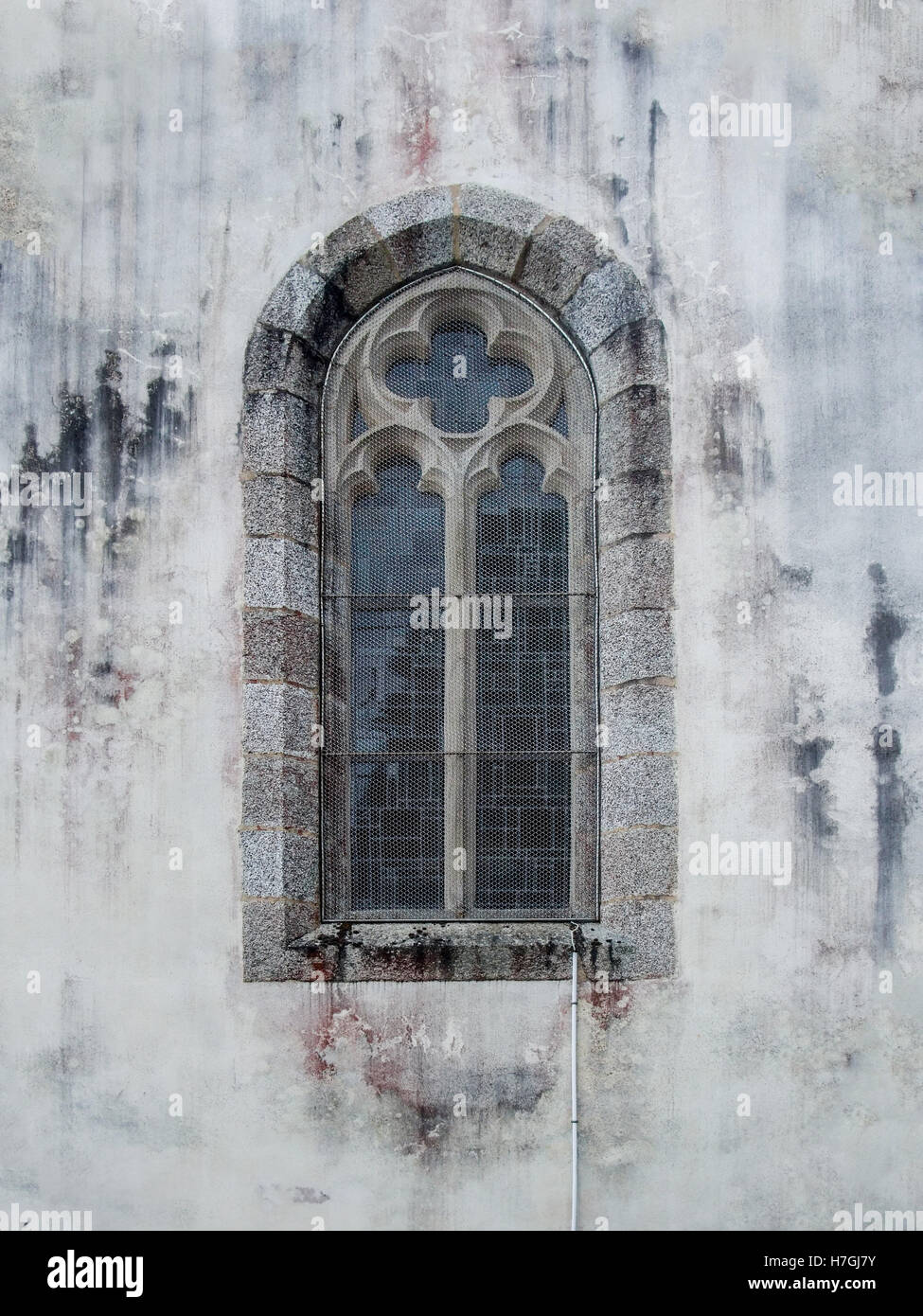rundown church window at Pont-Aven, a commune in the Finistere ...