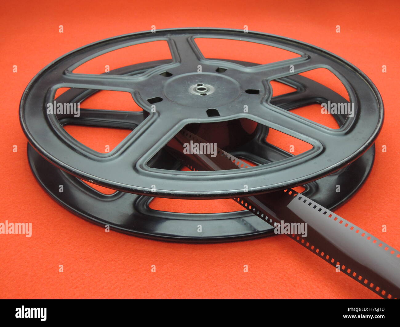 Film reel on red carpet Stock Photo - Alamy