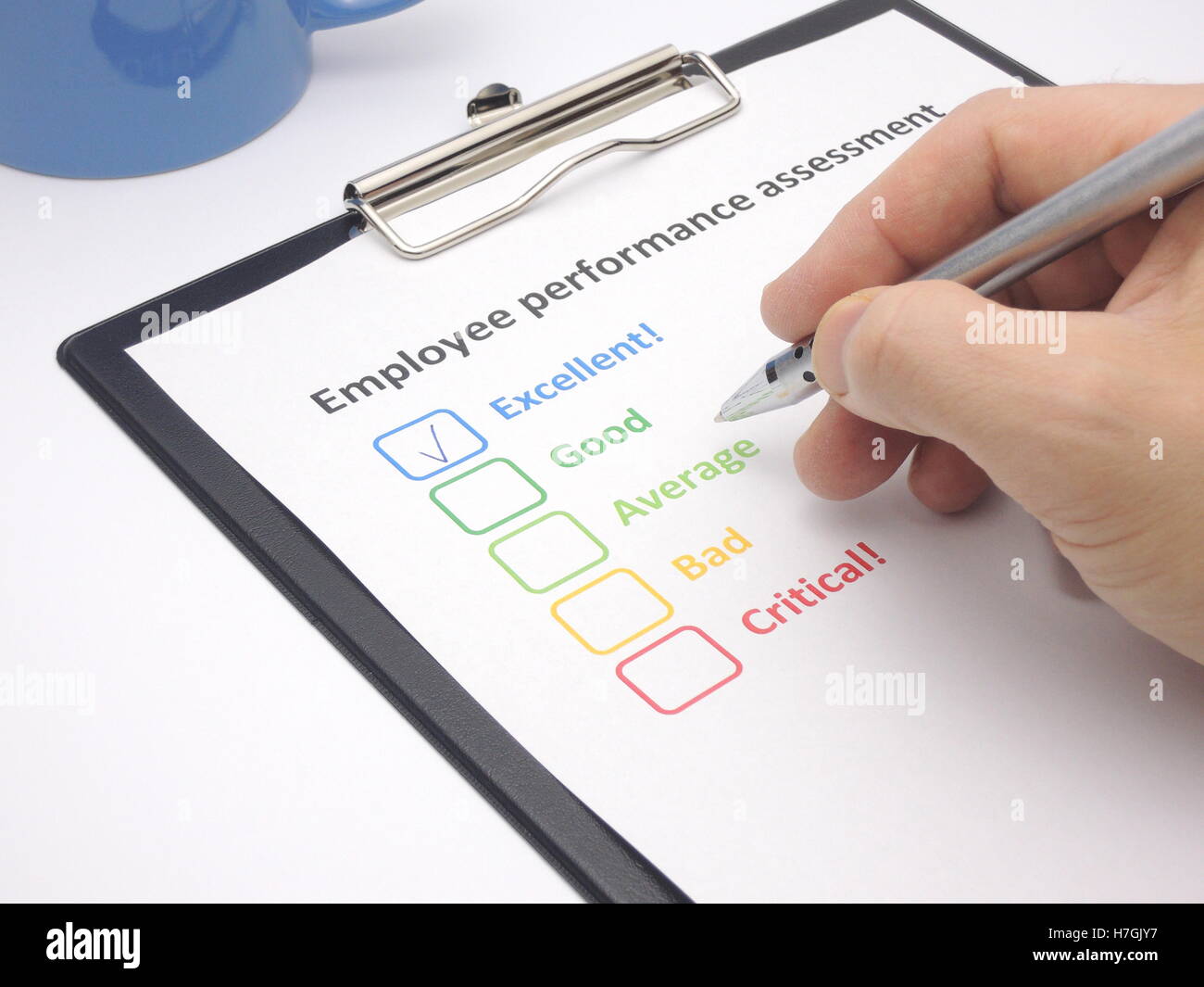 Rating excellent! in an employee performance assessment Stock Photo - Alamy