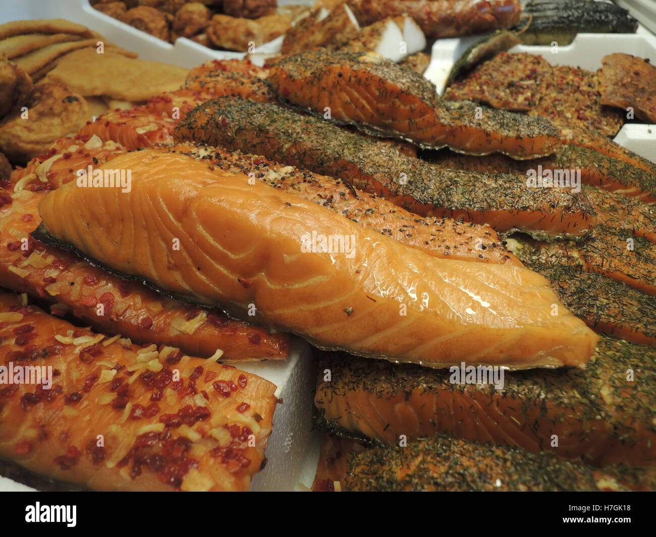 Assorted selection of smoked fish in fish shop Stock Photo - Alamy