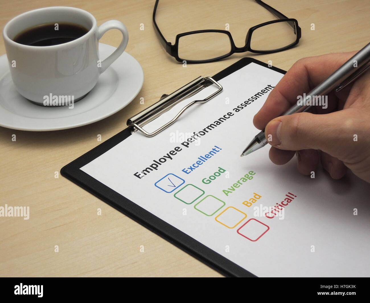 Rating excellent! in an employee performance assessment Stock Photo - Alamy