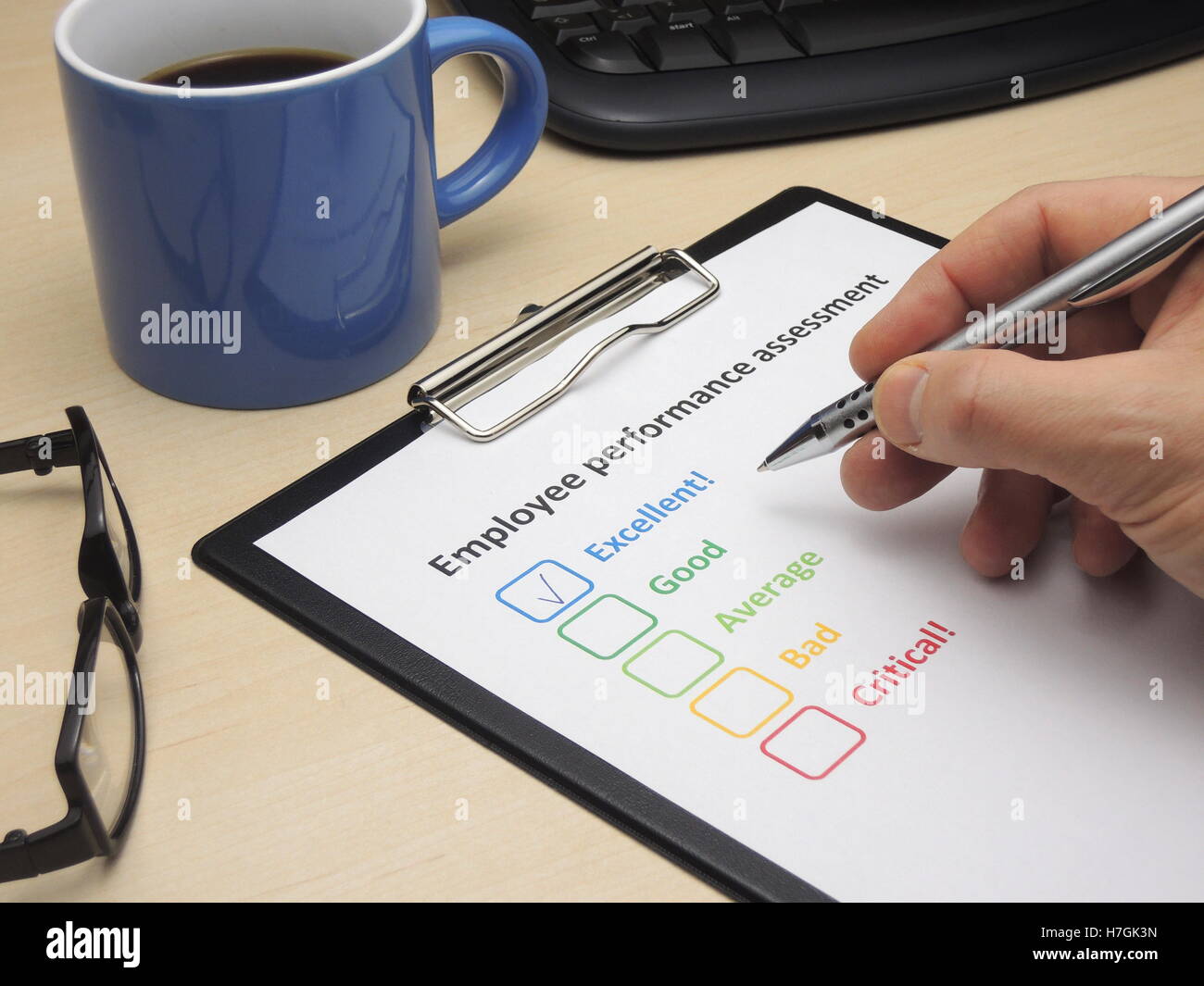 Rating excellent! in an employee performance assessment Stock Photo - Alamy