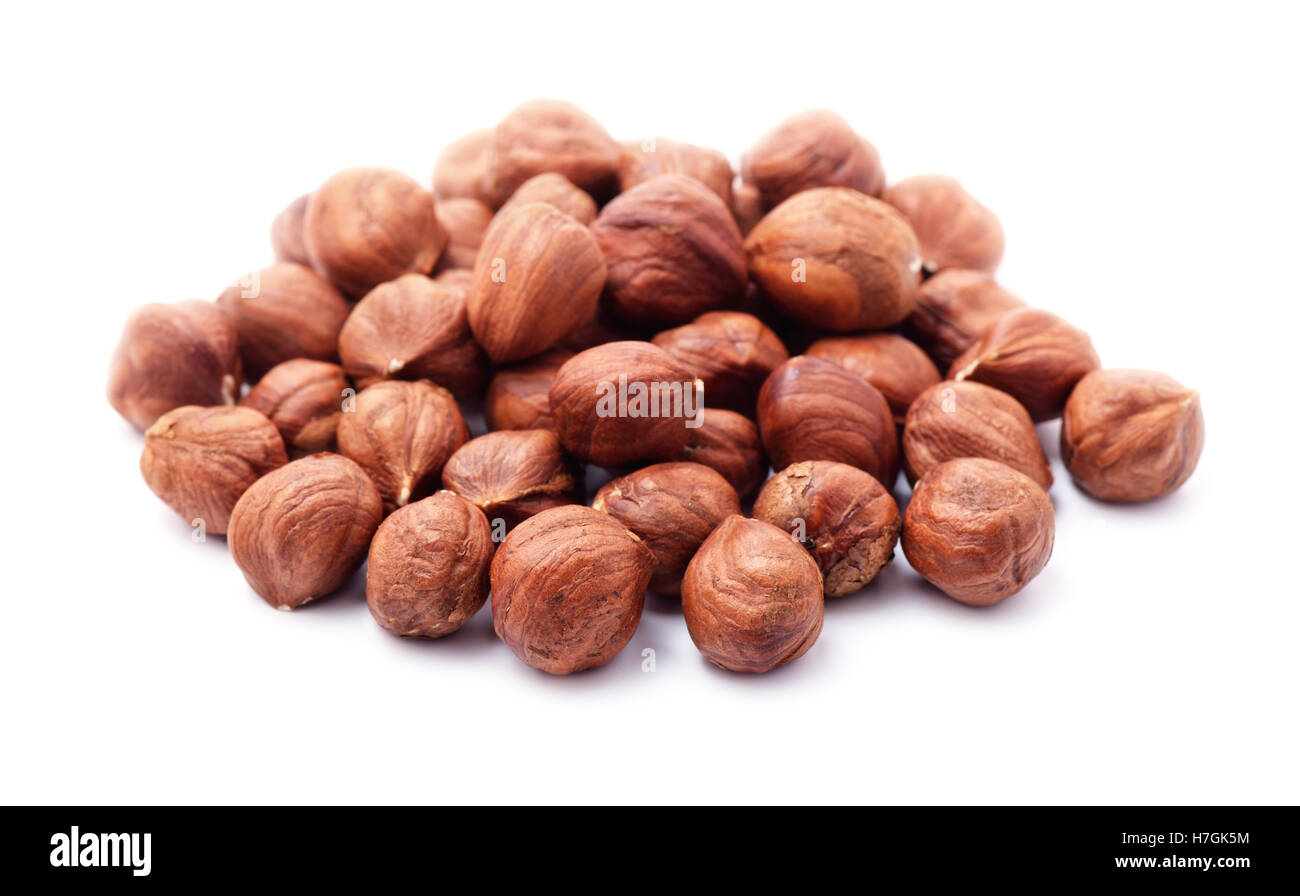Heap of purified hazelnuts isolated on a white background Stock Photo ...