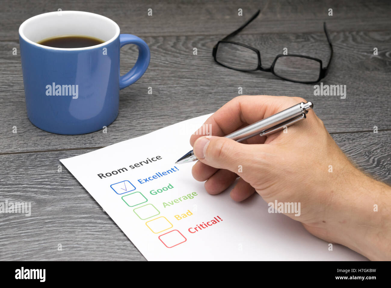 Filling out survey hi-res stock photography and images - Alamy