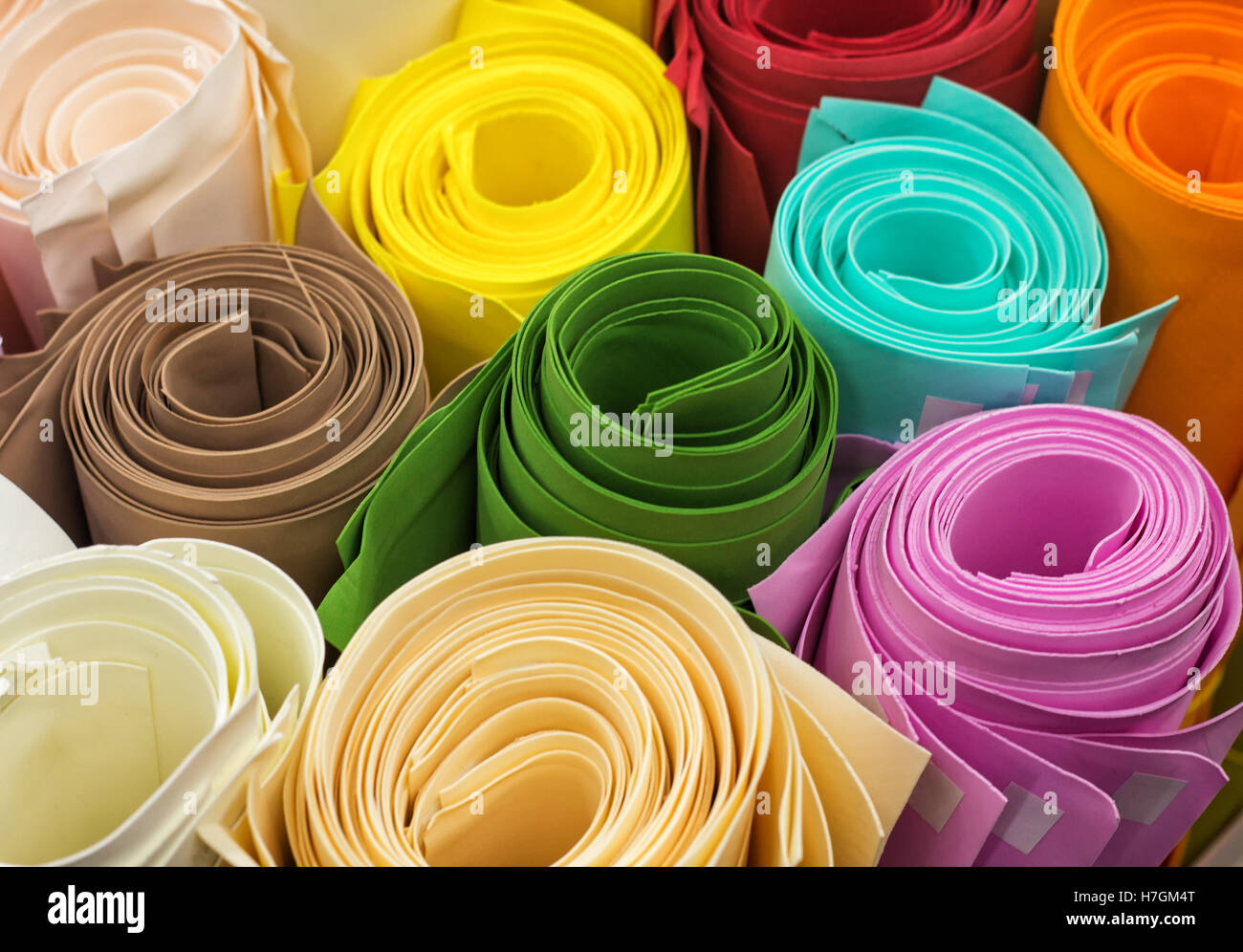 Rolls of colored paper - green, brown, blue, pink, orange, red, white ...