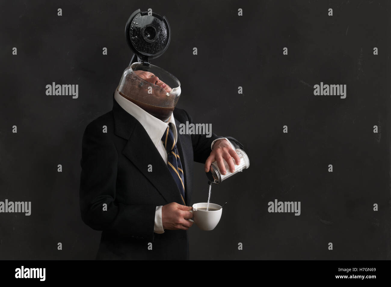 Man with Head in Coffee Pot Stock Photo - Alamy