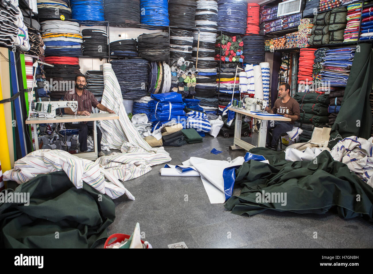 men sewing in a shop Stock Photo - Alamy