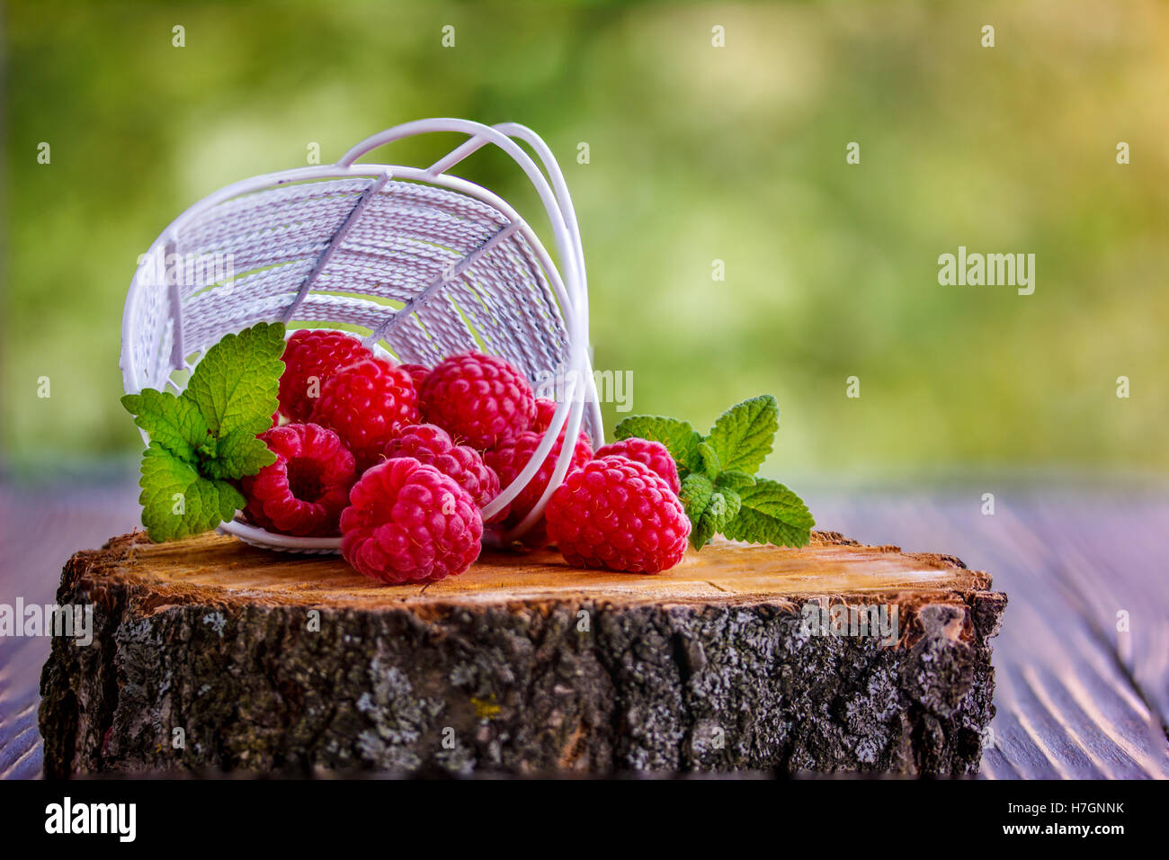Fresh raspberry in a basket Stock Photo - Alamy