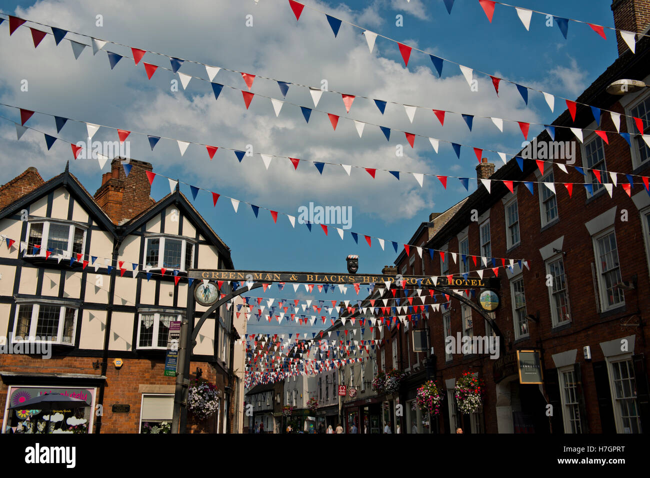 Bunting above the busy St John Street (A515) in Ashbourne, Derbyshire ...