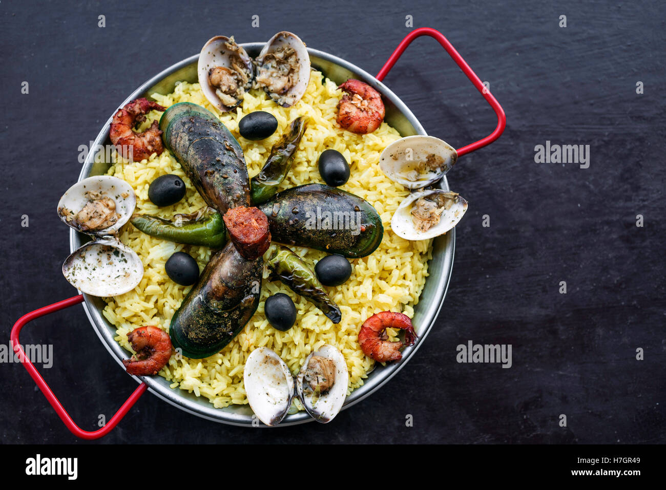 mixed fresh steamed seafood and rice paella famous traditional ...