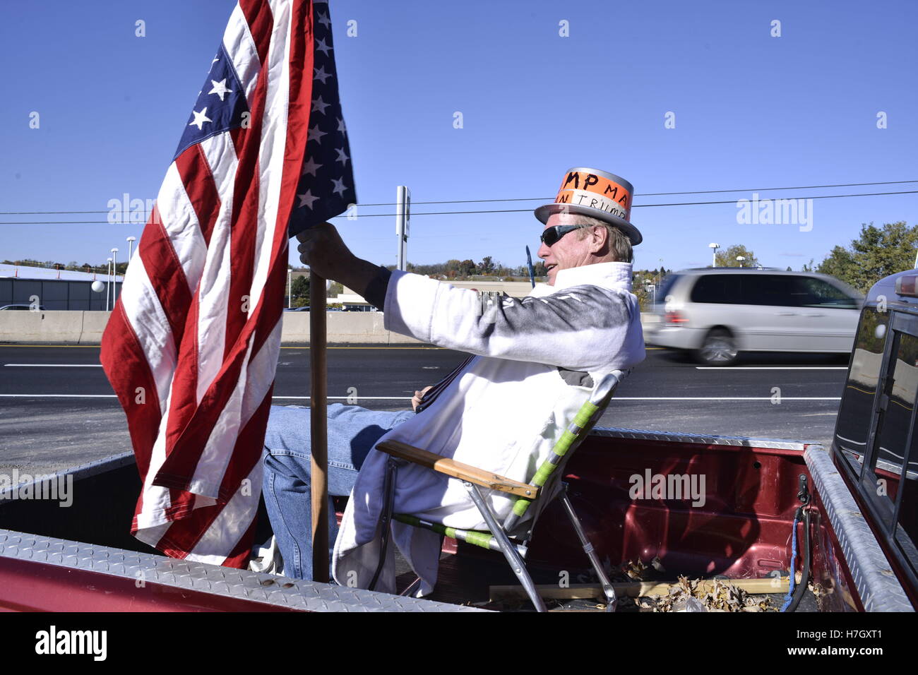 Pennsylvania, USA. 4th Nov, 2016. Sitting in the back of his Ford pick ...