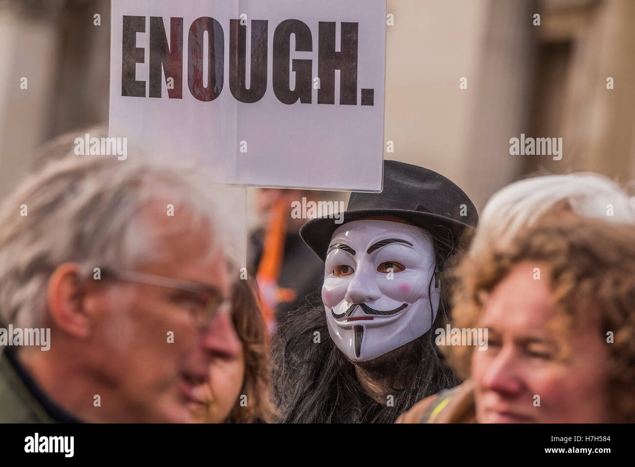 London, UK. 05th Nov, 2016. A few masked people join the crowd ...