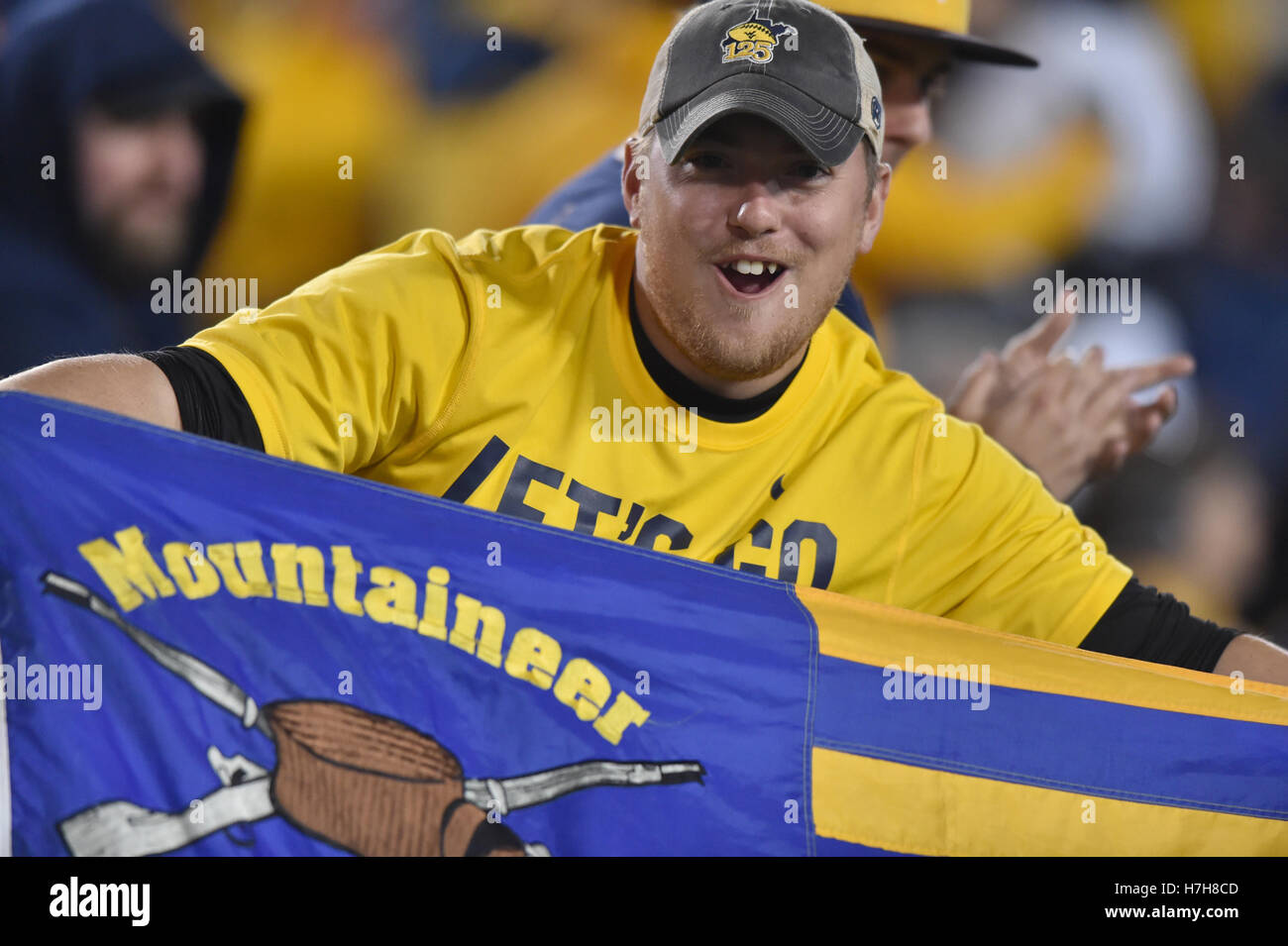 Morgantown, West Virginia, USA. 5th Nov, 2016. A WVU fan holds up a ...