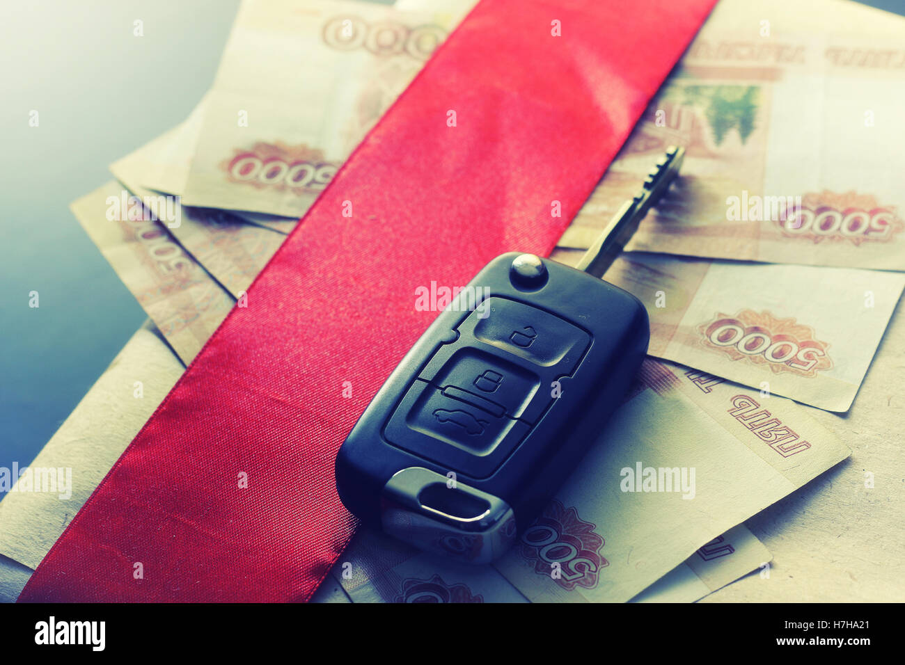 Money key gift Stock Photo - Alamy