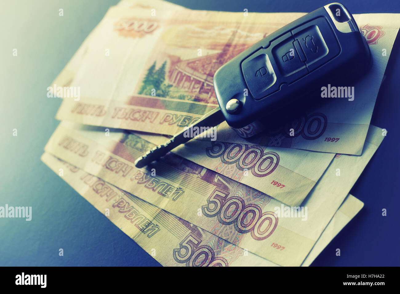 Money key gift Stock Photo - Alamy
