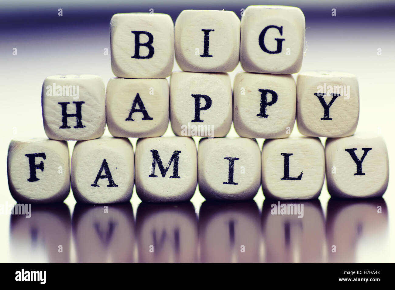 wood text cube family Stock Photo - Alamy