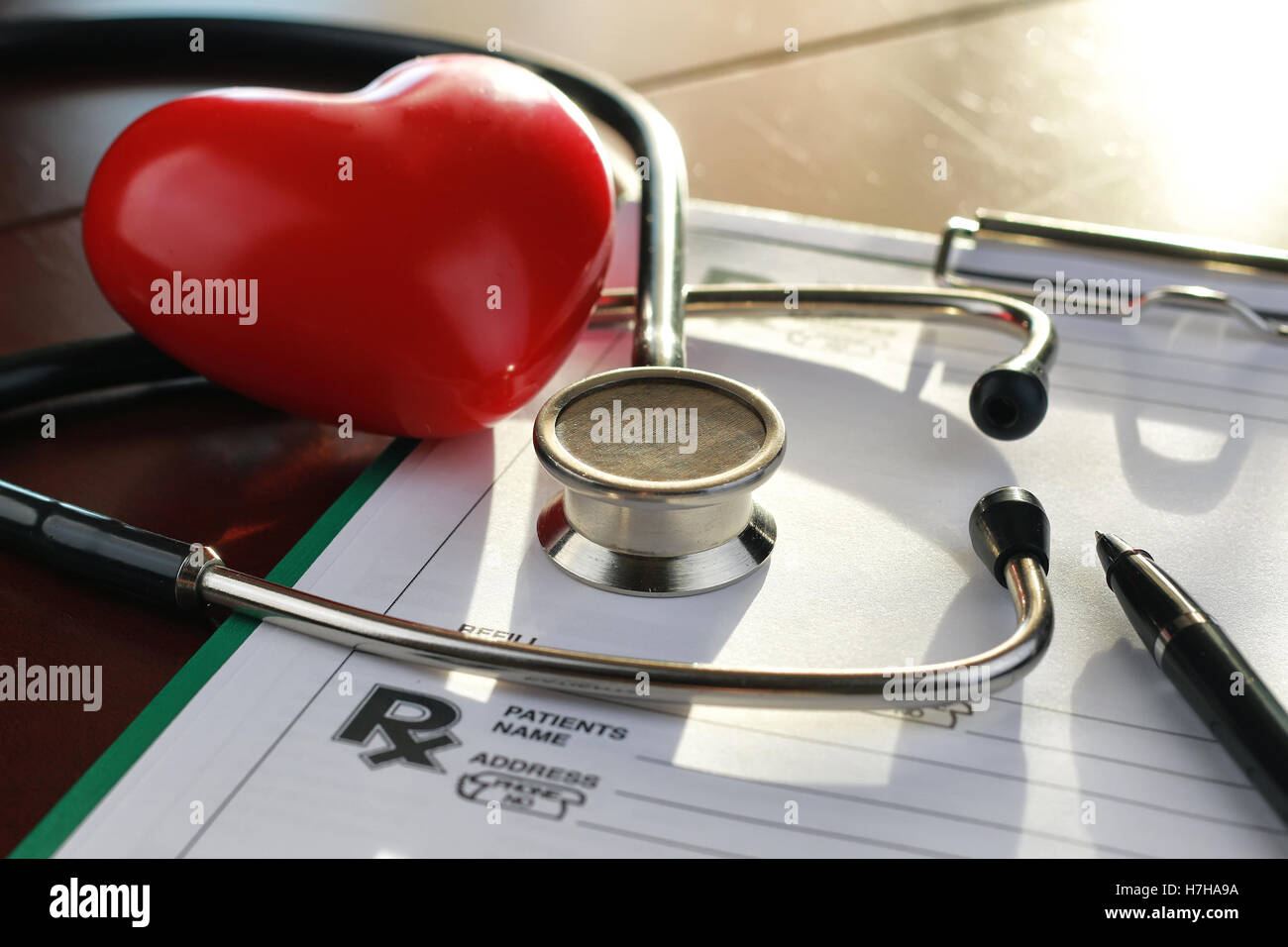 stethoscope medical documents pen Stock Photo - Alamy