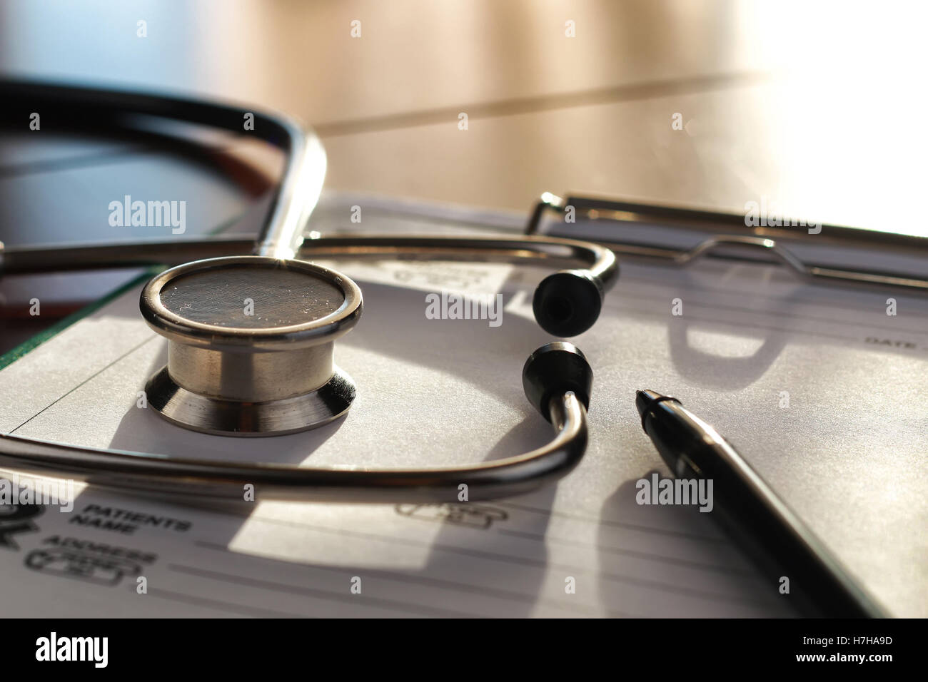 stethoscope medical documents pen Stock Photo - Alamy