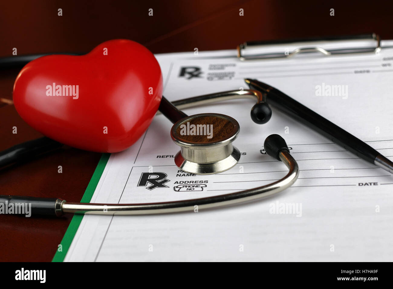 stethoscope medical documents pen Stock Photo - Alamy