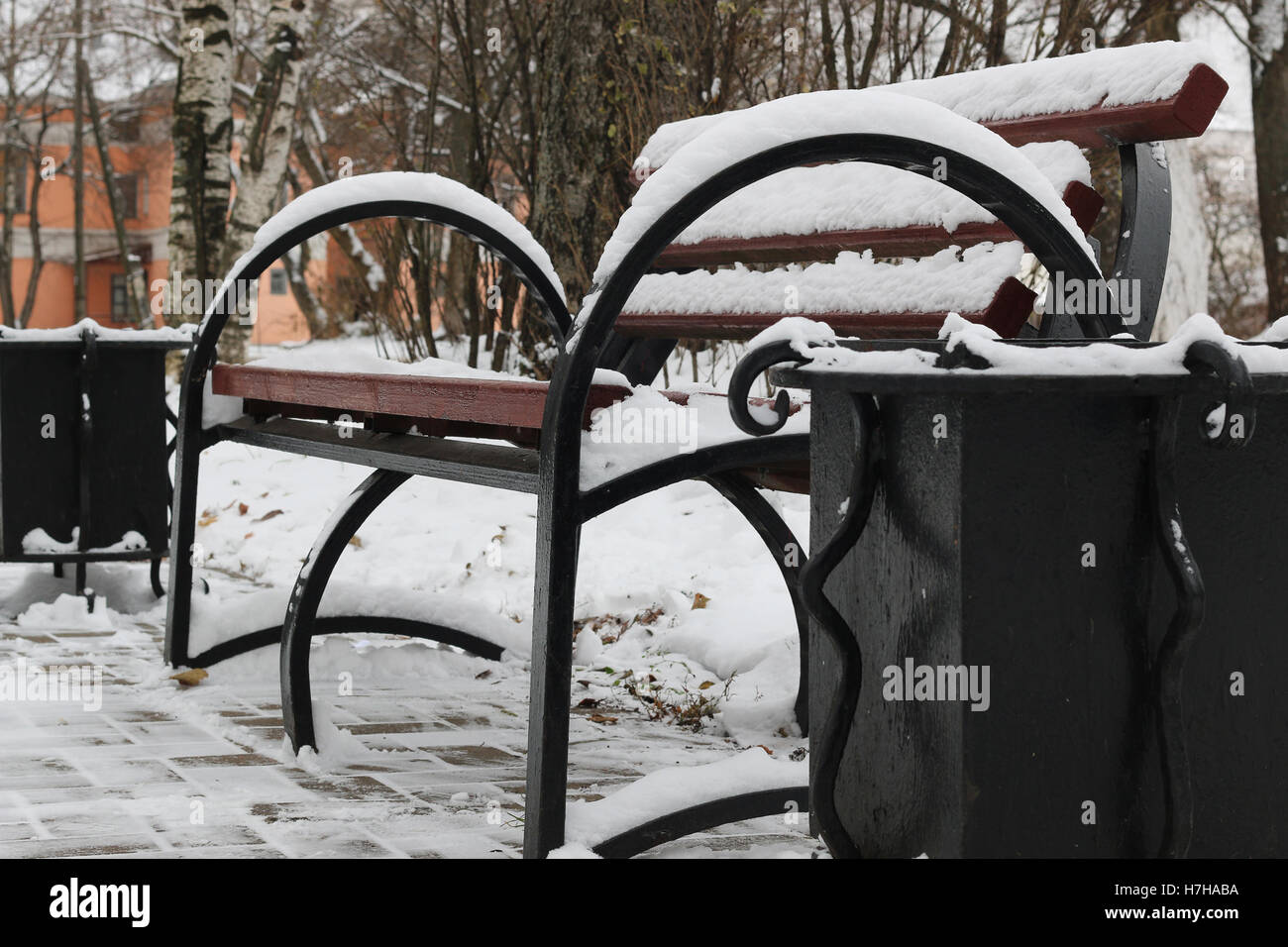 Winter bench in a park Stock Photo - Alamy