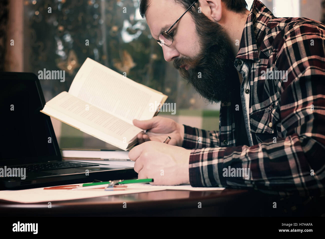 male work notebook bearded Stock Photo - Alamy