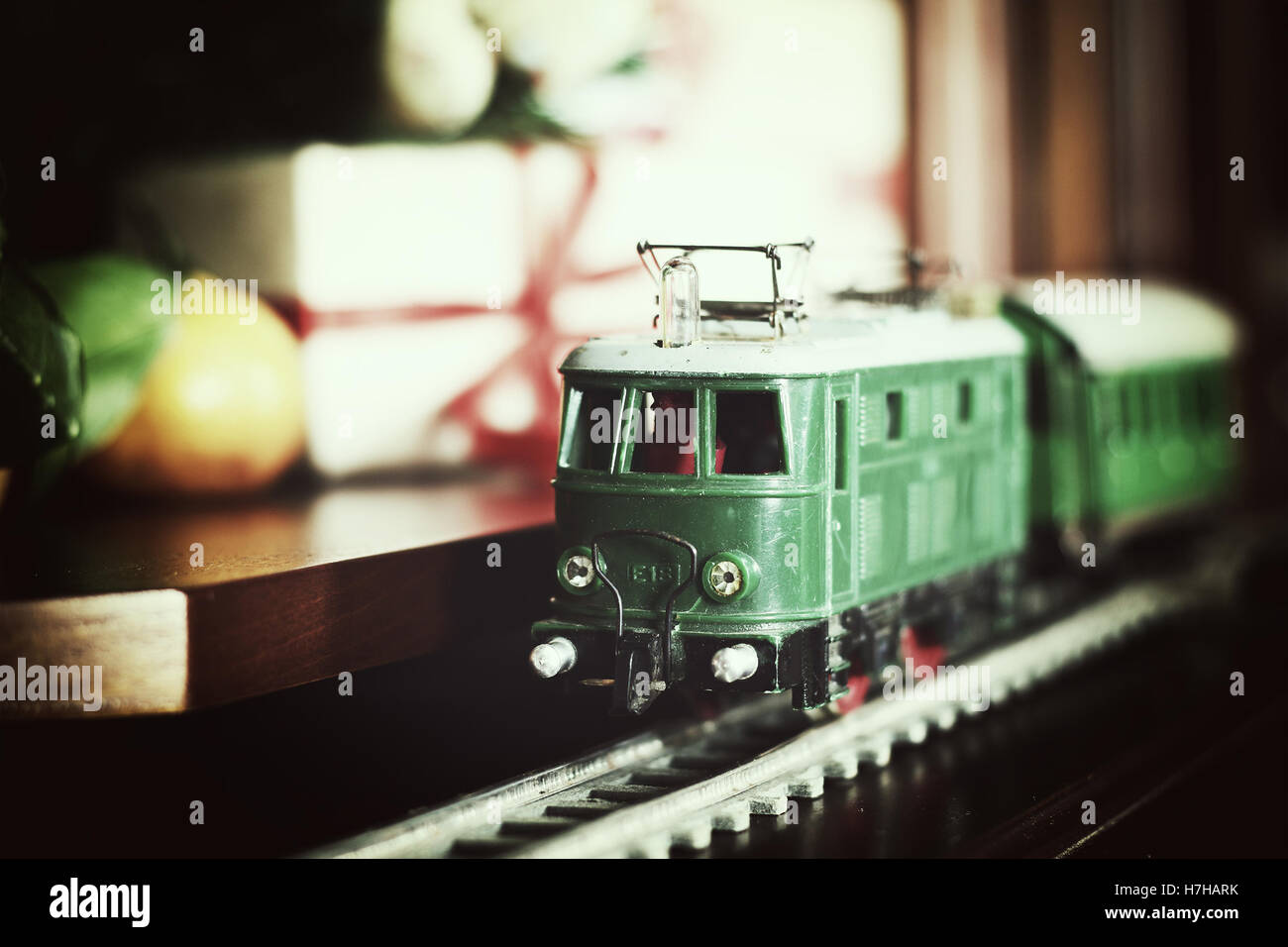 train under tree gift Stock Photo - Alamy