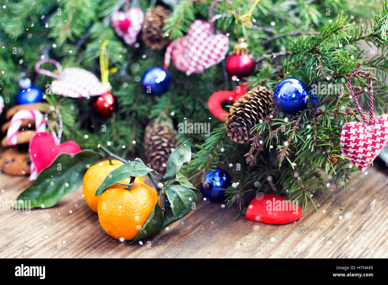 snow candle heart wine bottle Stock Photo - Alamy