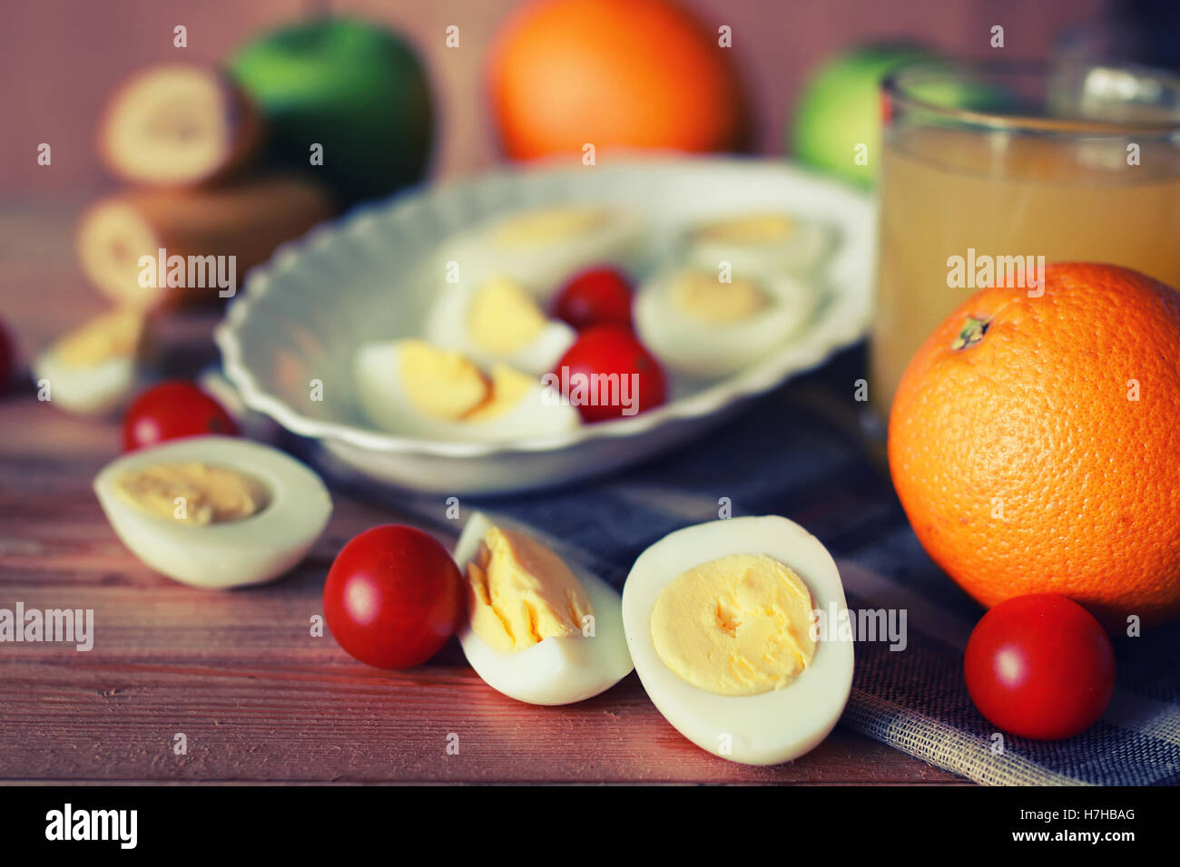 egg breakfast fruit wooden background Stock Photo - Alamy