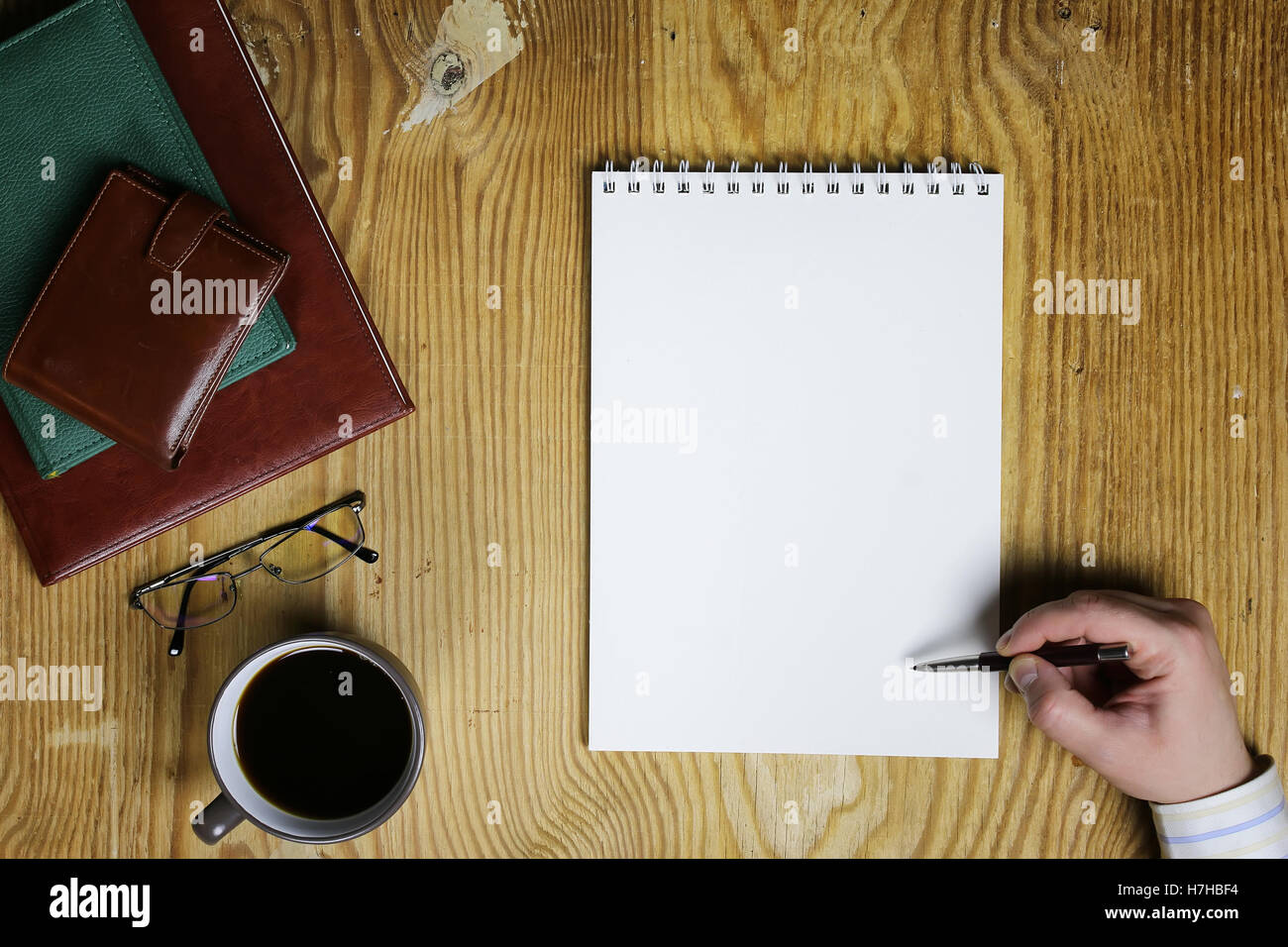 table write hand office view Stock Photo - Alamy