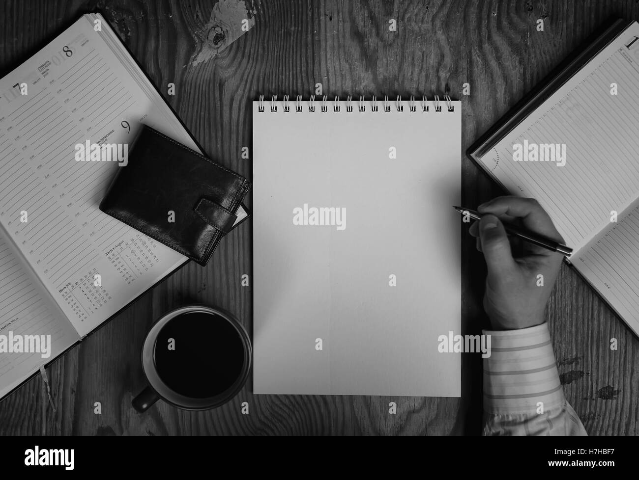 monochrome notebook paper writing tools Stock Photo - Alamy