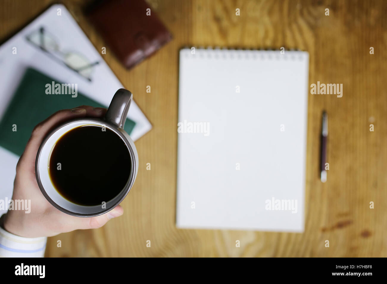 table write hand office view Stock Photo - Alamy