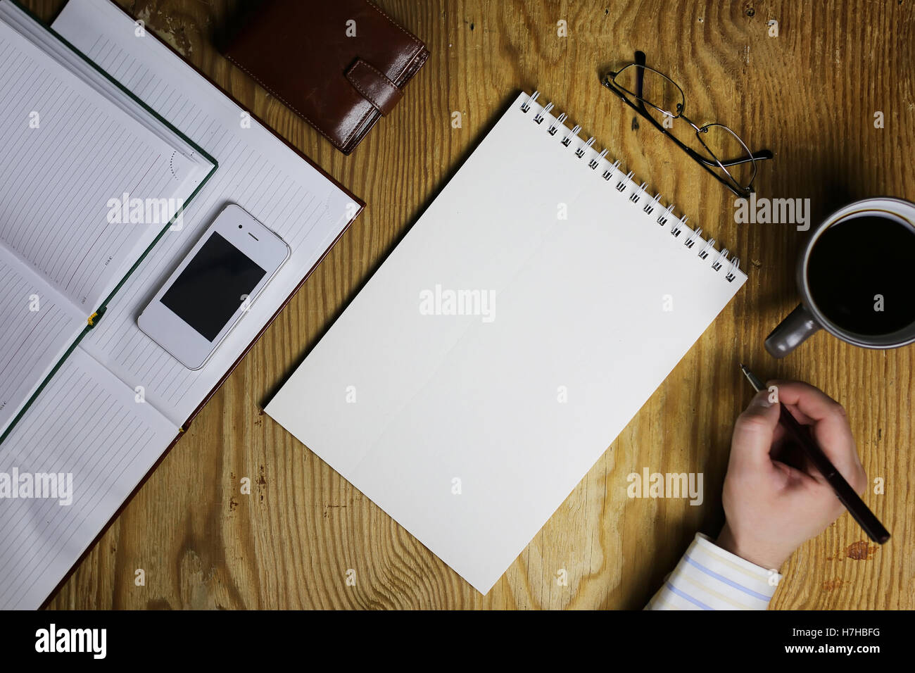 table write hand office view Stock Photo - Alamy