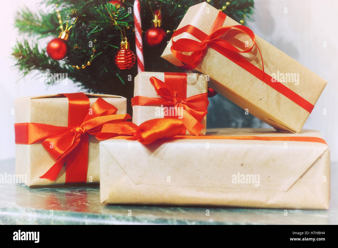 stack of gifts under a Christmas tree Stock Photo - Alamy