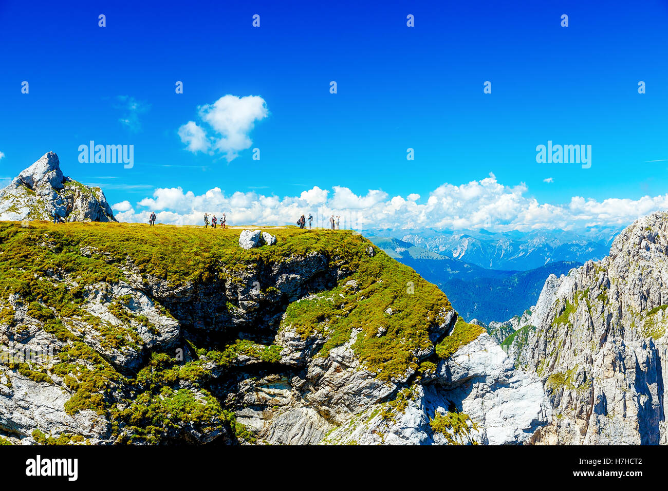people in beautiful summer alpine mountain landscape Stock Photo - Alamy