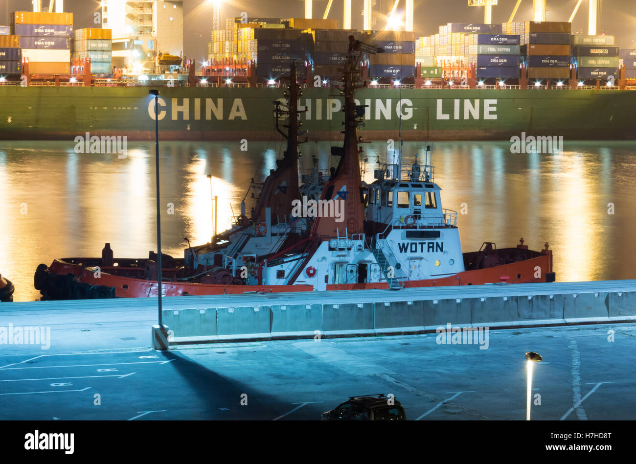 Pusher Tug Wotan with another pusher flaunts on the background of XIN ...