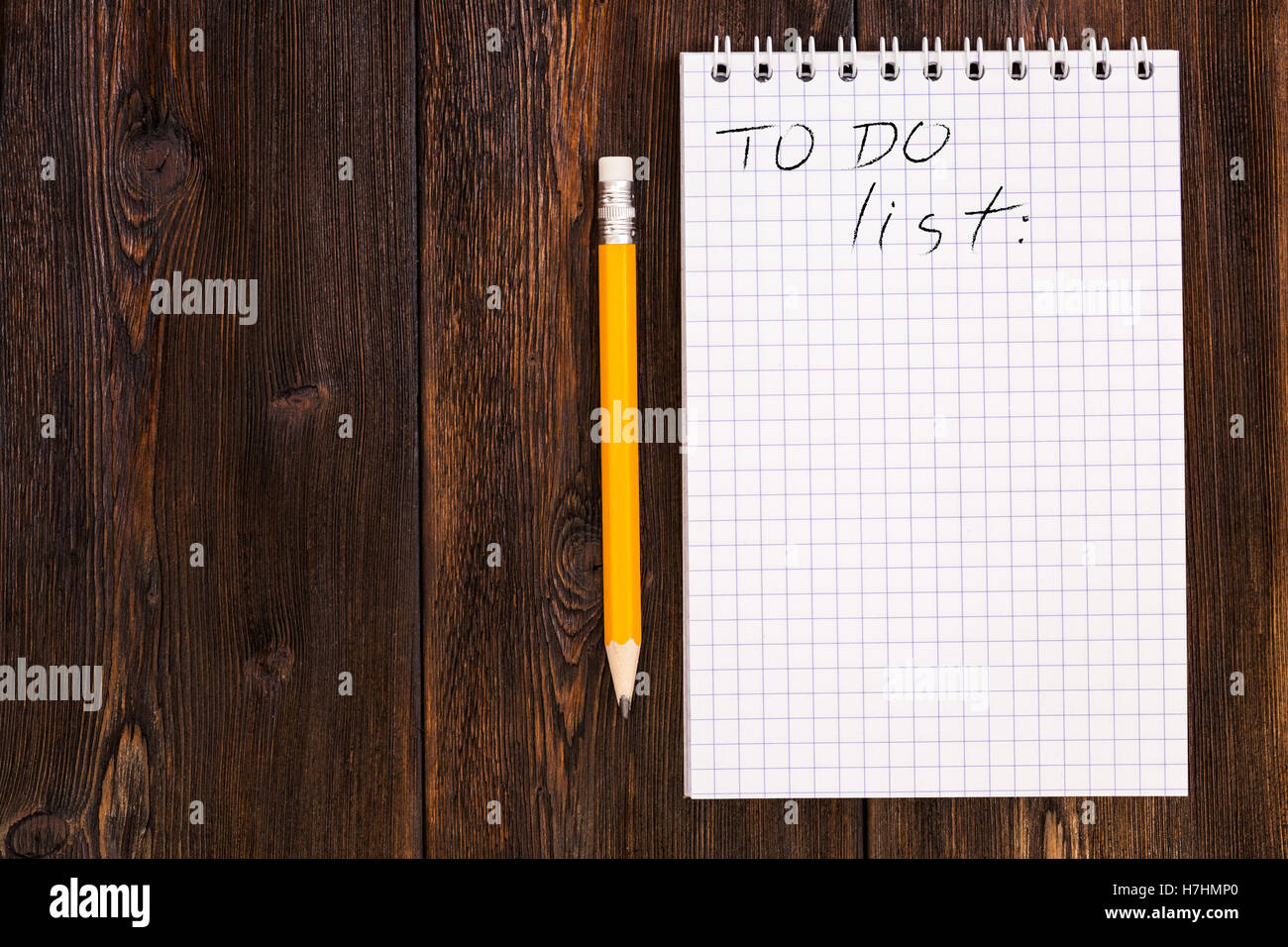 Blank notebook and pencil with todo list Stock Photo - Alamy