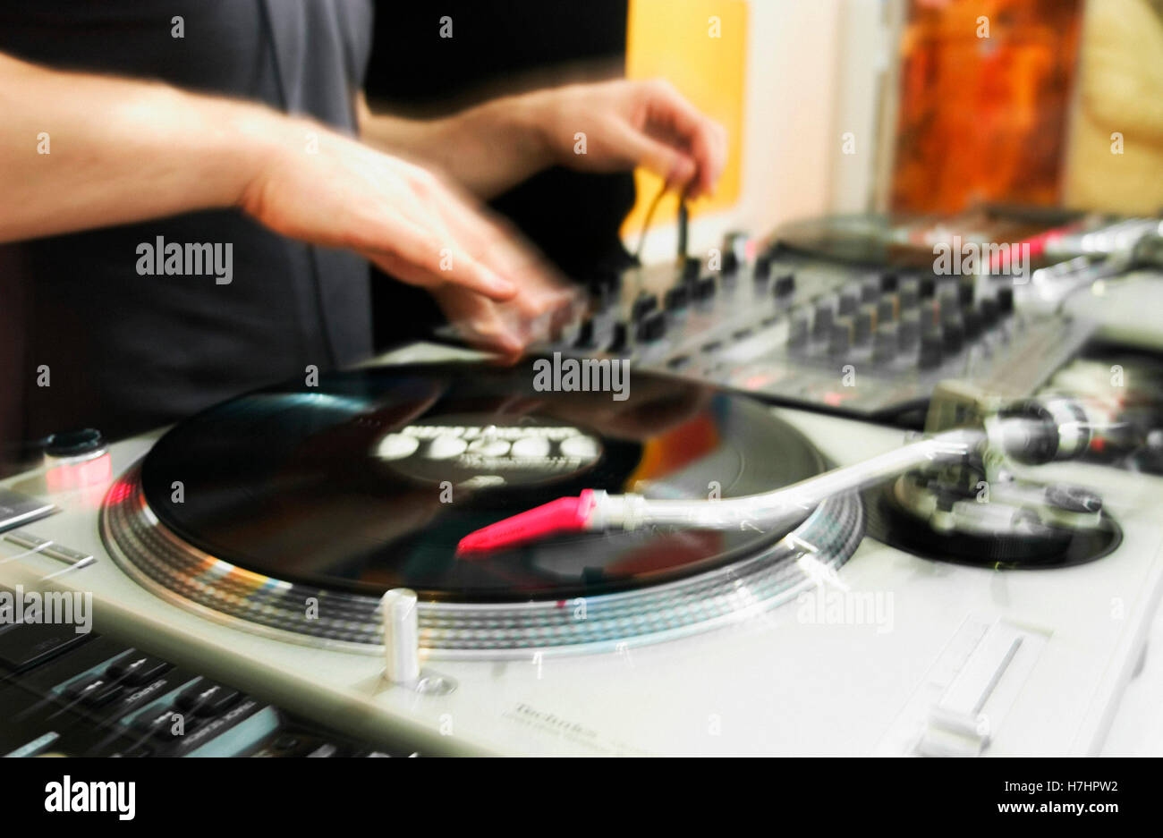 DJ on his turntables Stock Photo - Alamy