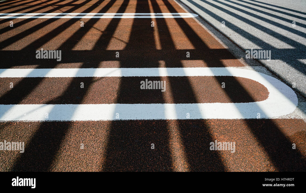 Light and Shadow pattern on the asphalt parking lot Stock Photo - Alamy