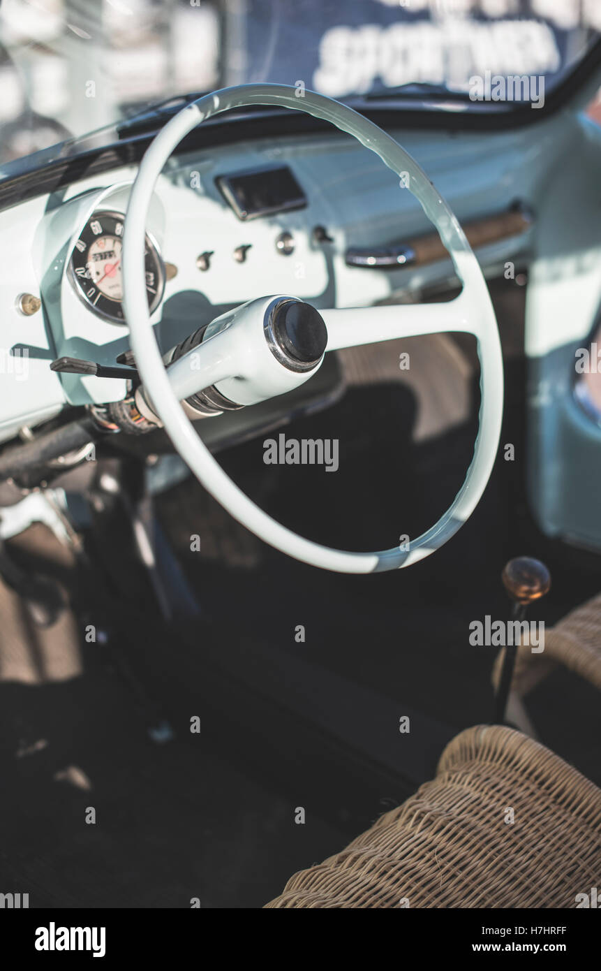 Vintage small blue car on sunlight Stock Photo - Alamy
