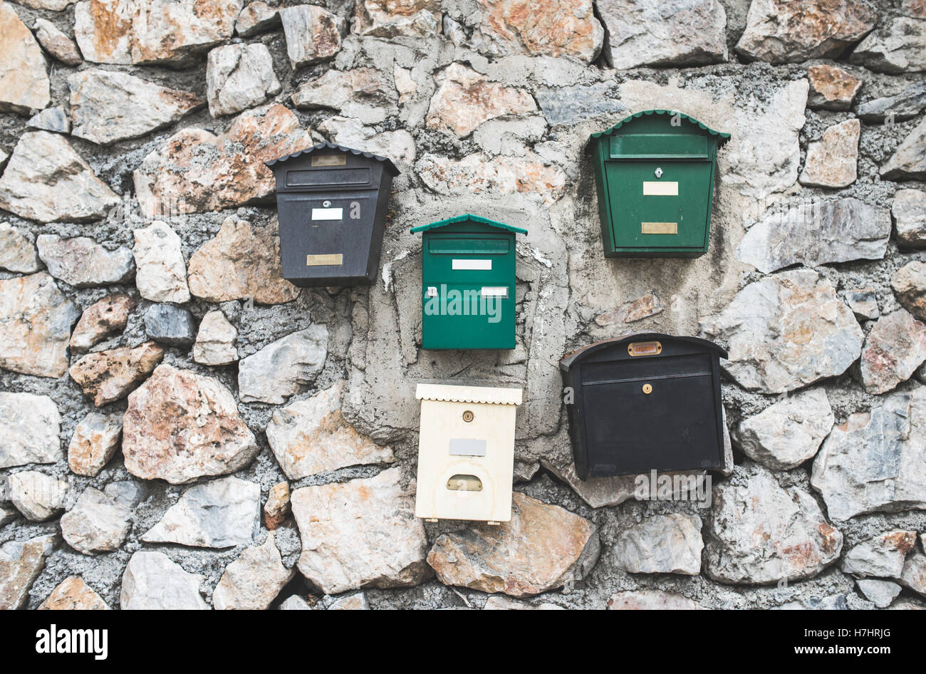 Various mailboxes. Different colors and shapes Stock Photo - Alamy