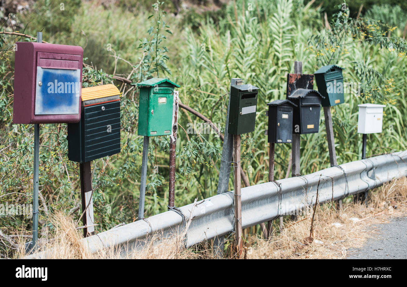 Various mailboxes. Different colors and shapes Stock Photo - Alamy